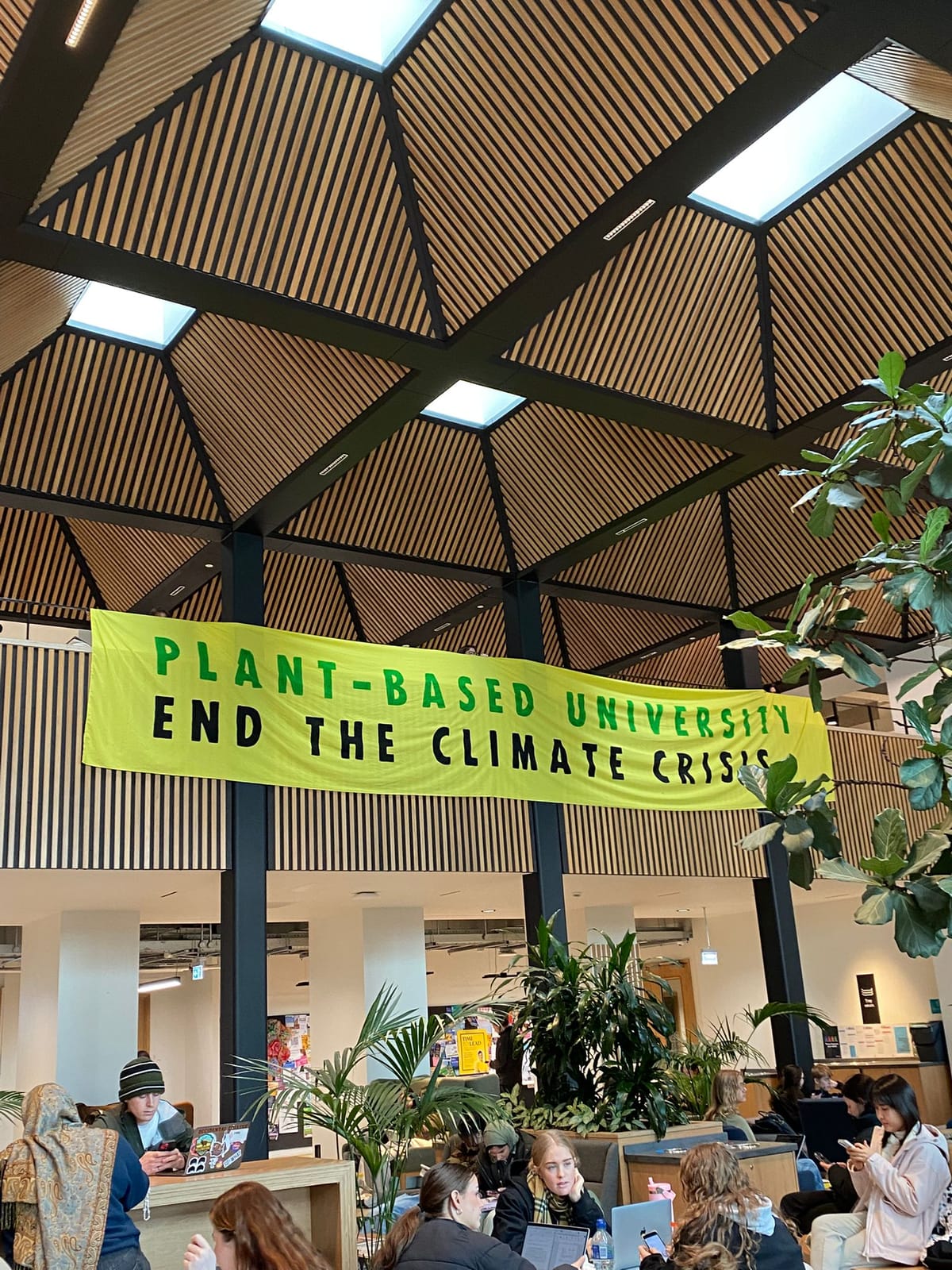 Plant Based Universities drop banner over Senate House balcony in ...